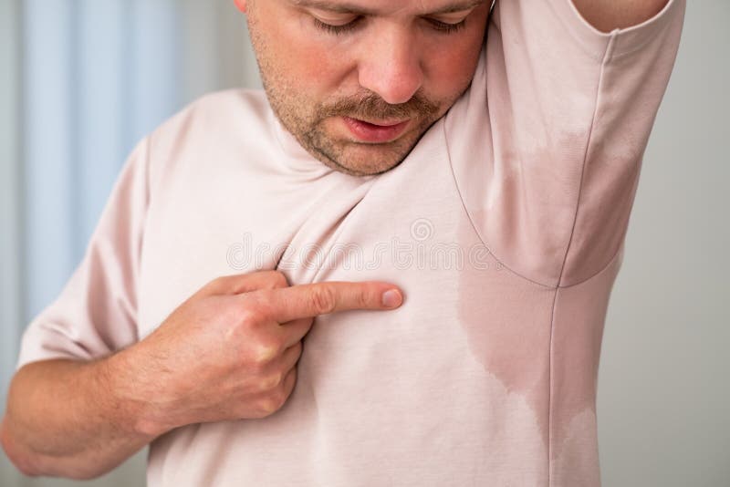 Man with Hyperhidrosis Sweating Very Badly Under Armpit Stock Photo ...