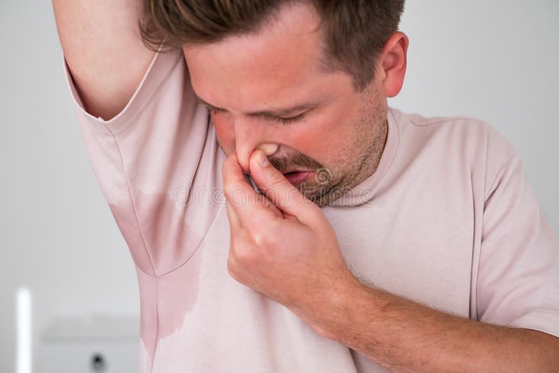 Man with Hyperhidrosis Sweating Very Badly Under Armpit Stock Image ...