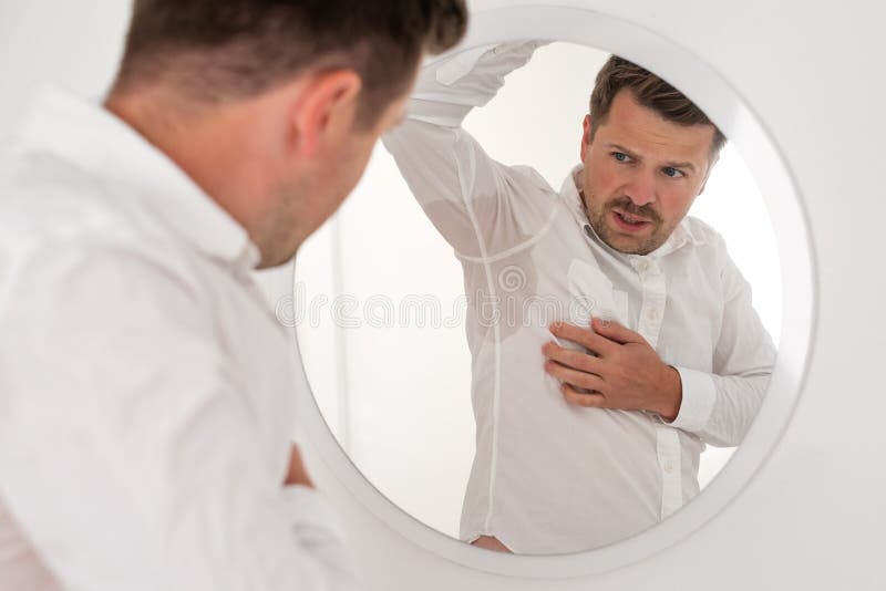 Man with Hyperhidrosis Sweating Very Badly Under Armpit Stock Image ...
