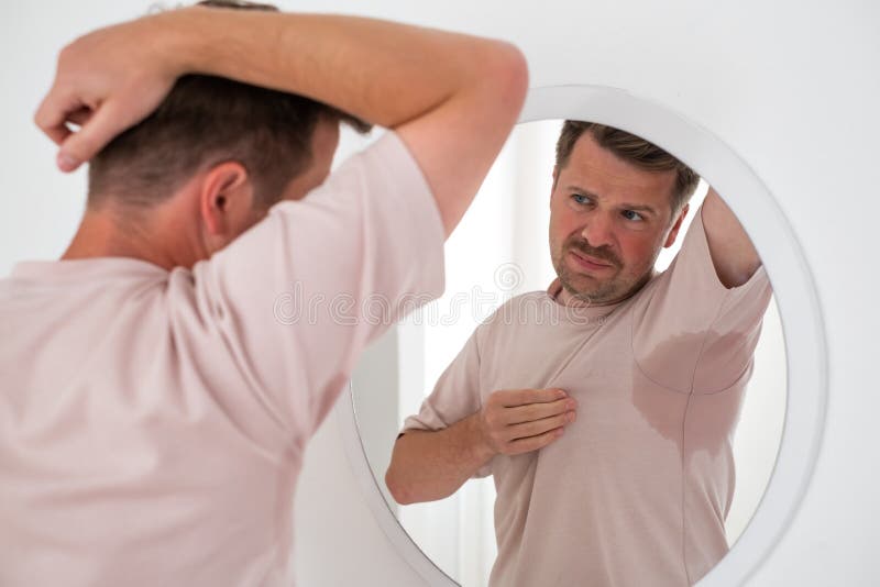 Man with Hyperhidrosis Sweating Very Badly Under Armpit Stock Image ...