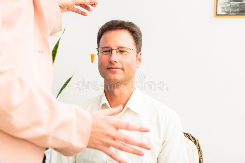 Man Being Hypnotized Therapist Stock Photos - Free & Royalty-Free Stock ...
