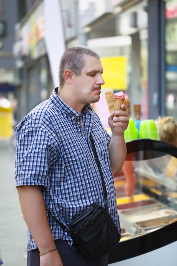 Man with ice cream stock photo. Image of dessert, furious - 32446796