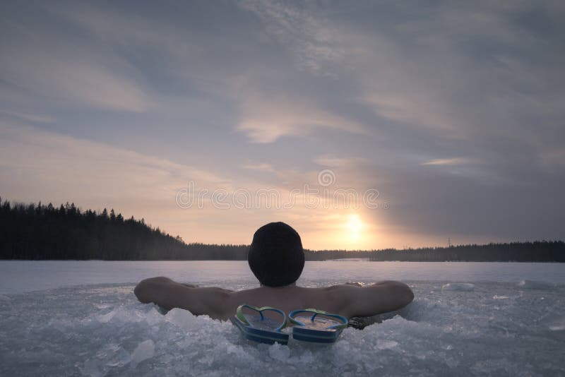 The Man in the Ice-hole Admires the Sunset. Back View Stock Image ...