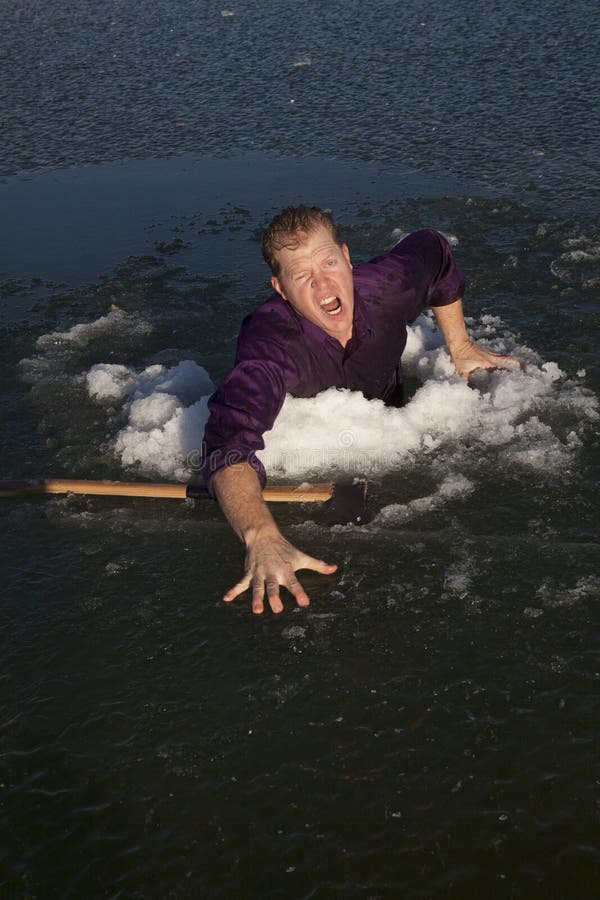 Man in Ice Hole Axe Climb Out Stock Image - Image of reaching, chopping ...