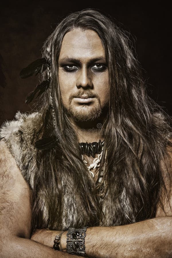 Man in the Image of the Barbarian with Decorations of Beads and ...