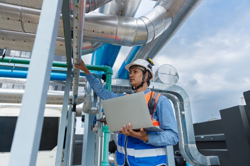 Man Industrial Engineer with Walkie Talkie Pointing Work at Rooftop ...