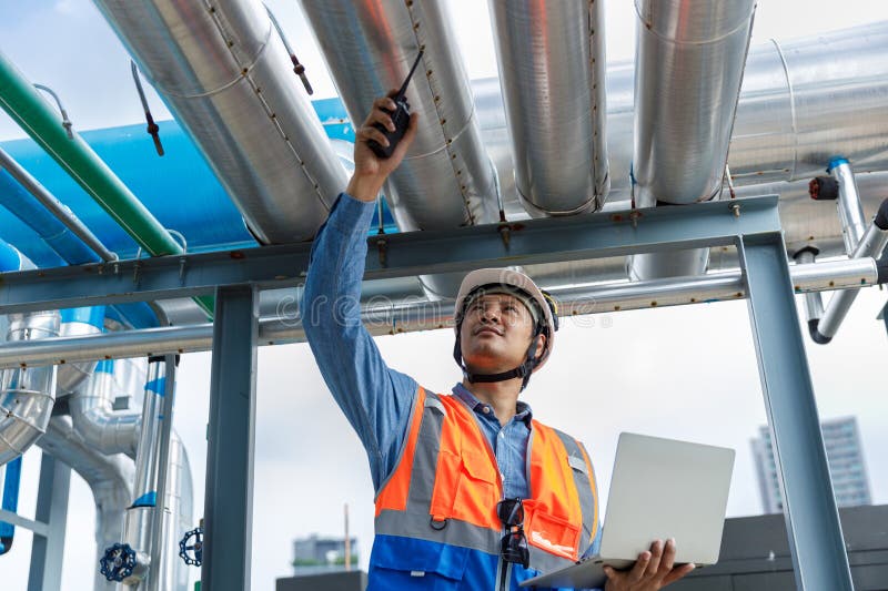 Man Industrial Engineer with Walkie Talkie Pointing Work at Rooftop ...