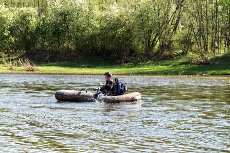 Man in an Inflatable Boat Floats on River Stock Image - Image of action ...