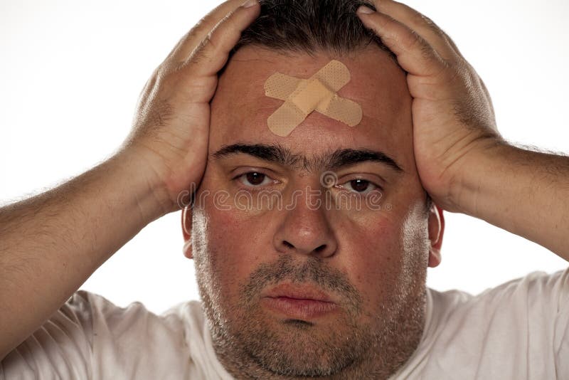 Man with injured forehead stock image. Image of face - 87080715