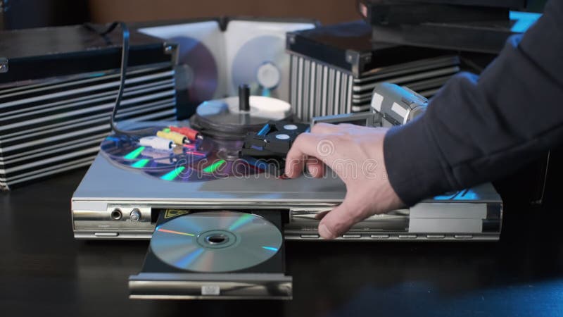 Inserting VHS Video Cassette Tape. Pressing Play Button on Vintage 1980 ...