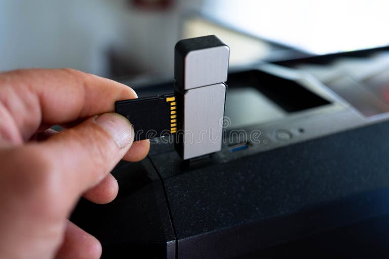 Man Inserting an SD Card in Card Reader Stock Photo - Image of close ...