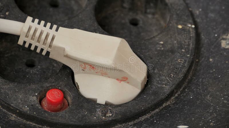 Man Inserts Electric Plug into Socket Stock Video - Video of black ...