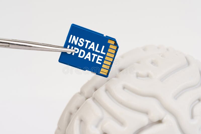 A Man Inserts a Memory Card into His Brain with the Inscription ...