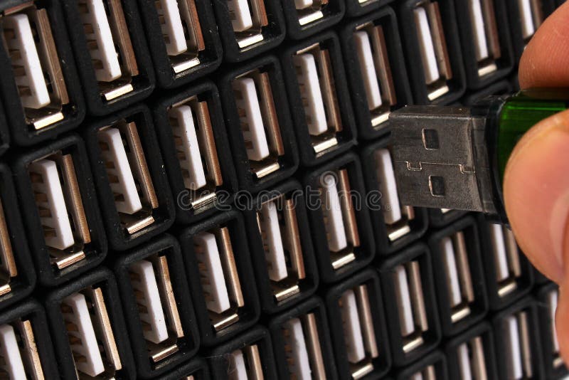 Man Inserts USB Flash Drive in One of Many Sockets Stock Image - Image ...