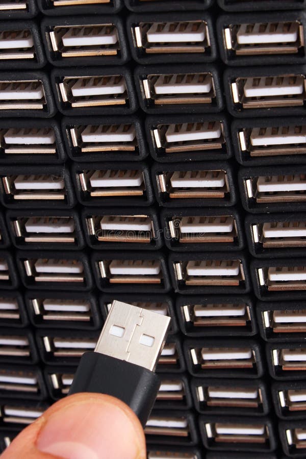 Man Inserts USB Flash Drive in One of Many Sockets Stock Image - Image ...