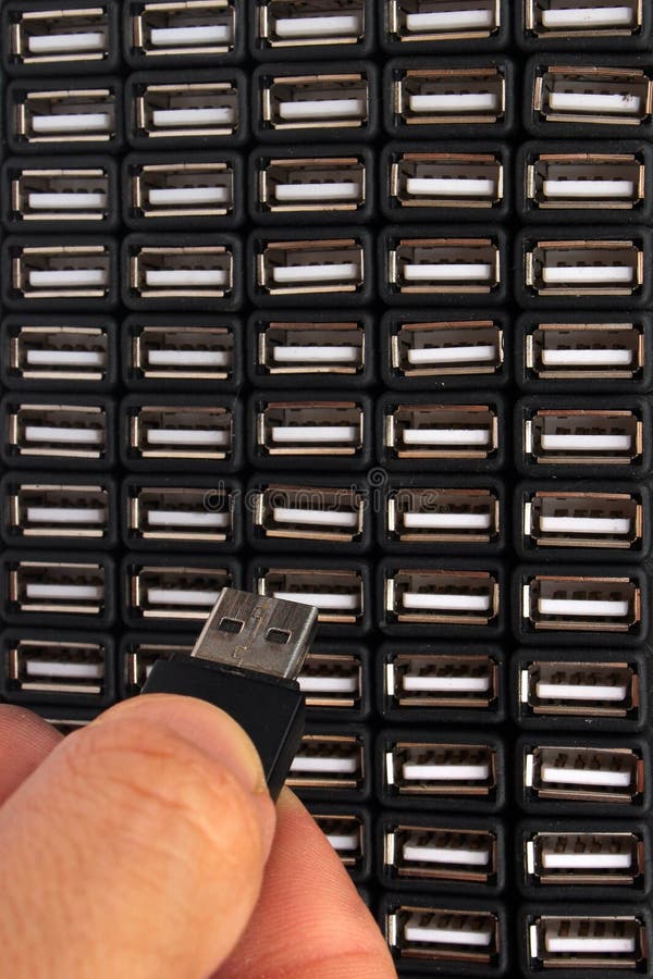 Man Inserts USB Flash Drive in One of Many Sockets Stock Image - Image ...