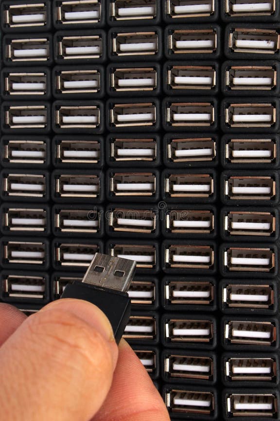 Man Inserts USB Flash Drive in One of Many Sockets Stock Image - Image ...