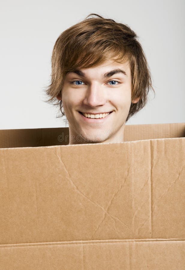 Man inside a card box stock photo. Image of emotion, cardboard - 26635342