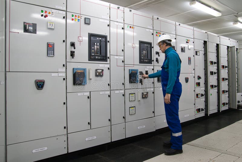 Man is Inside Electrical Energy Distribution Substation Stock Image ...