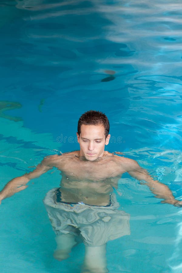 Man inside the pool stock image. Image of relax, active - 65087845