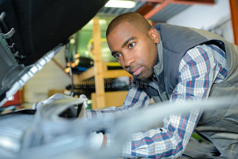 Man inspecting car stock image. Image of defect, work - 258968855
