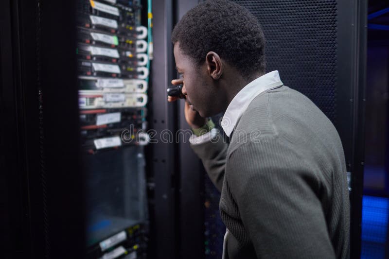 Man Inspecting or Managing Data Center Server Node Stock Photo - Image ...