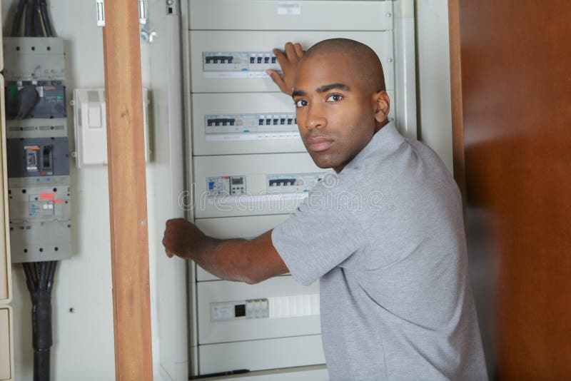 Man inspecting panel stock image. Image of repair, signal - 258548263