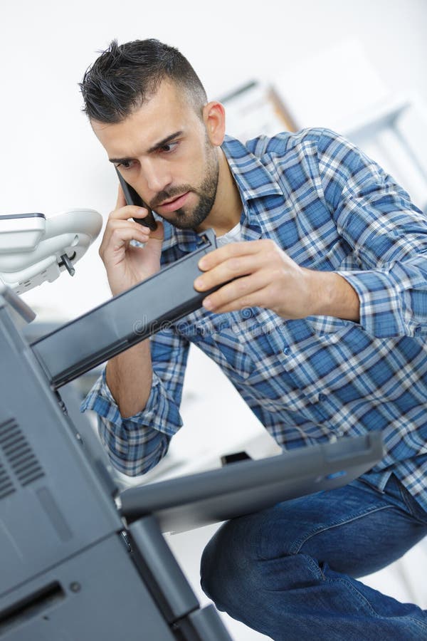 Man Inspecting Printing Machine Stock Image - Image of establishment ...