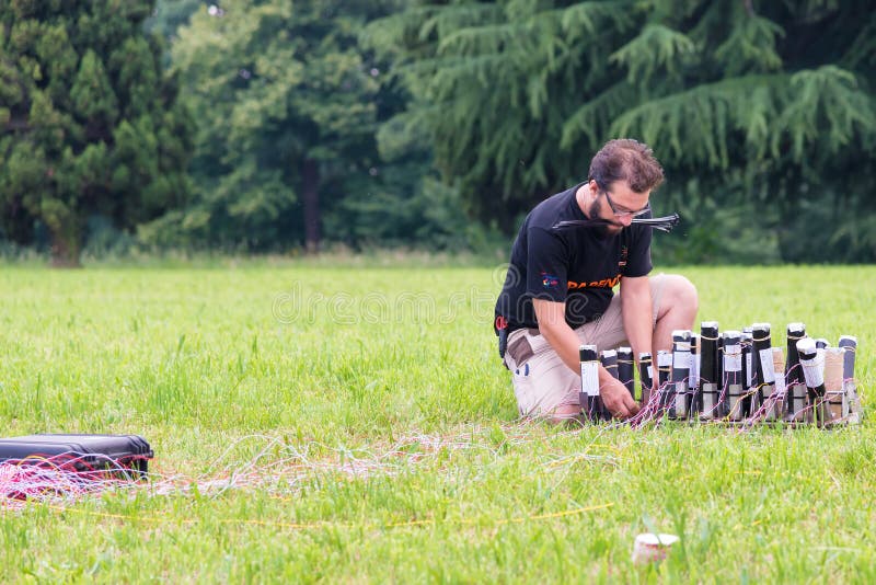 Man installing fireworks editorial stock photo. Image of explosive ...