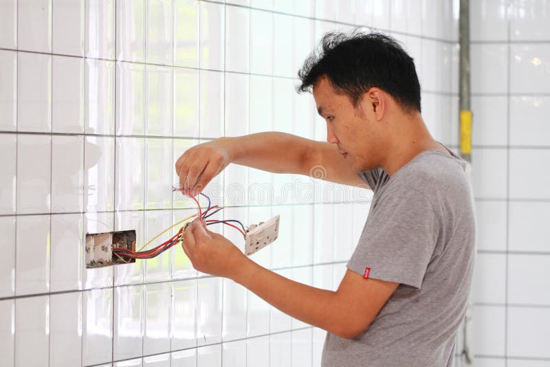 Man Installing Light Switch Stock Image - Image of estate, installing ...