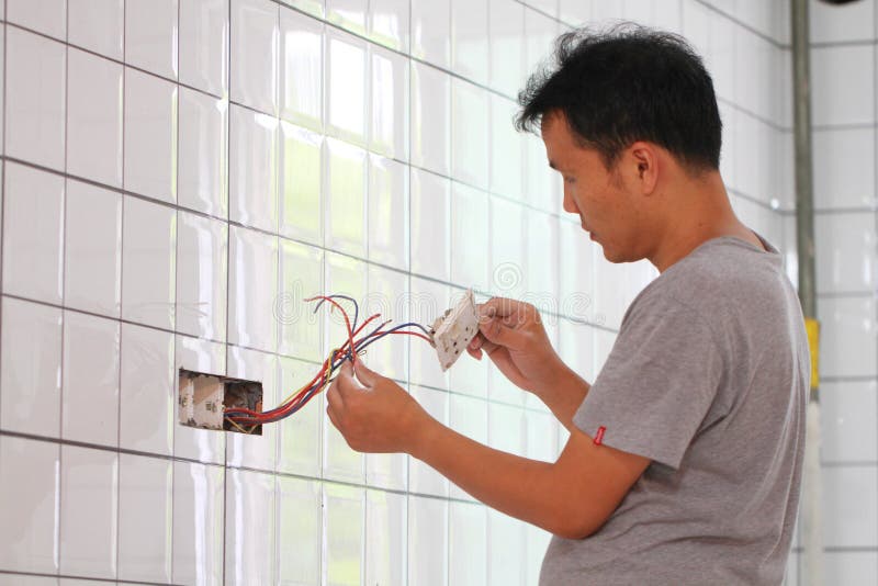 Man Installing Light Switch Stock Image - Image of connect, home: 100634761