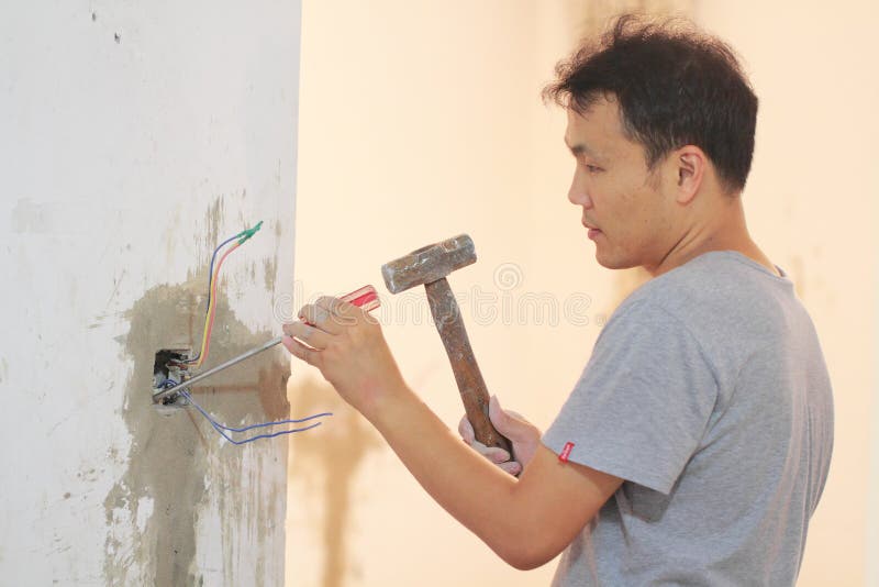 Man Installing Light Switch Stock Photo - Image of home, closeup: 100635852