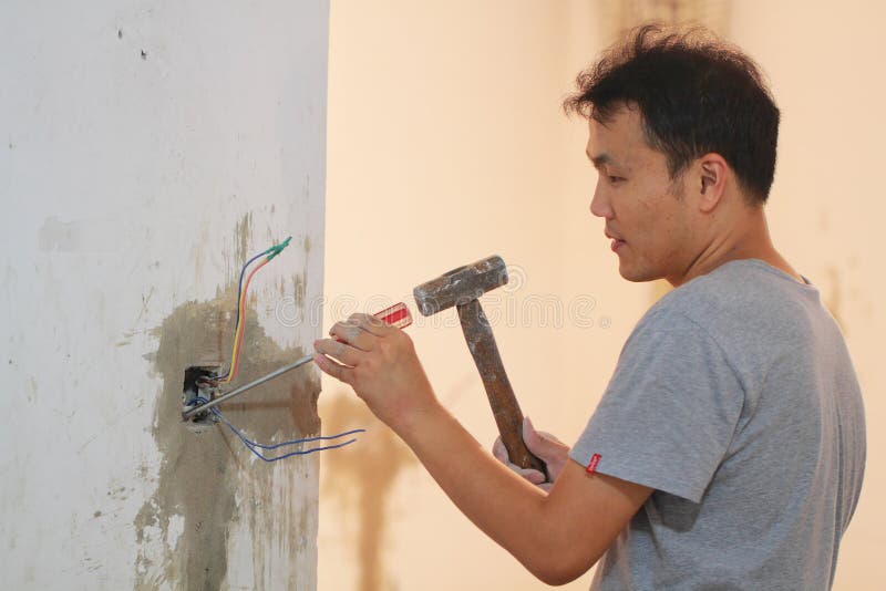 Man Installing Light Switch Stock Photo - Image of estate, electrical ...