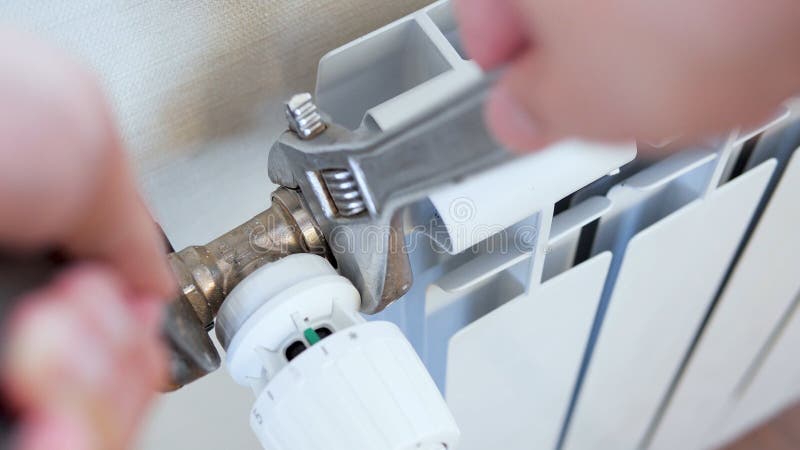 Man Installing Radiator Valve Close Up Stock Image - Image of regulator ...