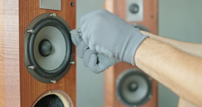 Man Installing a Speaker into an Audio System Cabinet. Stock Video ...
