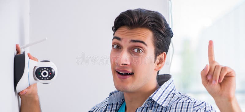 Man Installing Surveillance CCTV Cameras at Home Stock Image - Image of ...