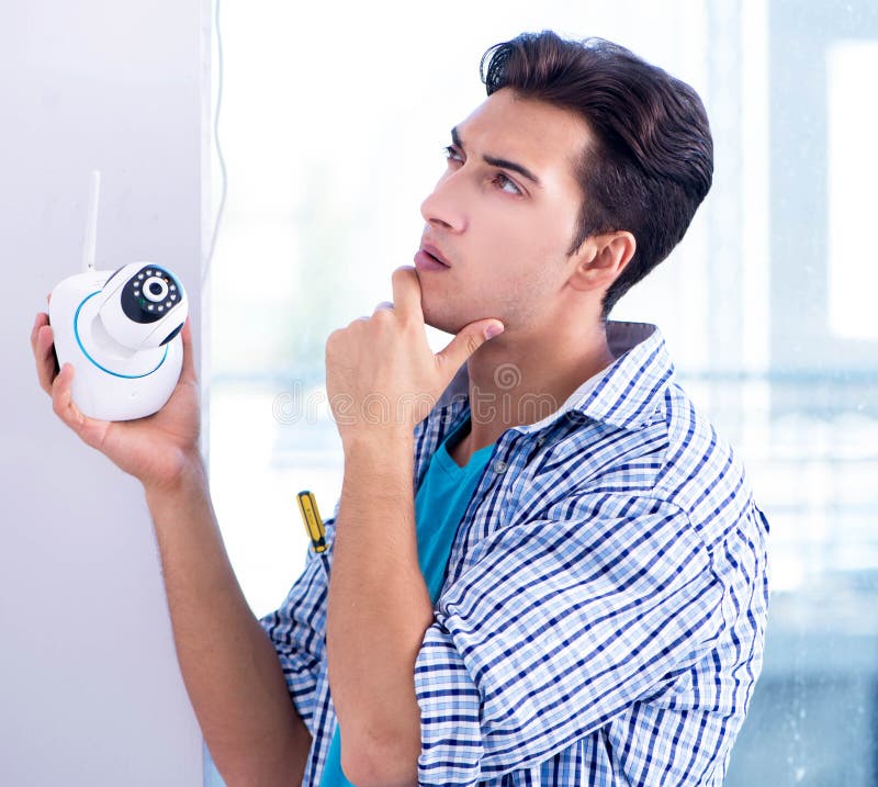 Man Installing Surveillance CCTV Cameras at Home Stock Image - Image of ...