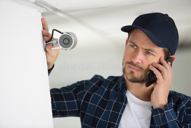 Man Installing Surveillance Cctv Cameras at Home Stock Photo - Image of ...