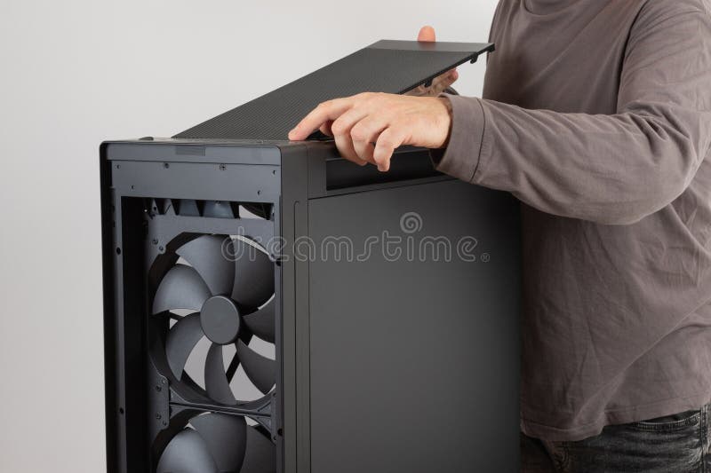 Man Installing Top Panel with Dust Filter from PC Case, Empty Big Tower ...