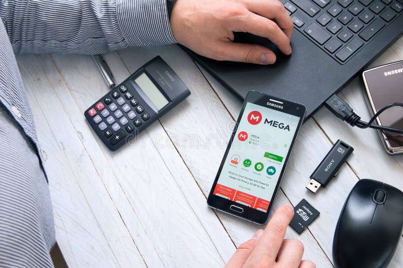 Man Installs MEGA Application Editorial Photo - Image of mobile, card ...