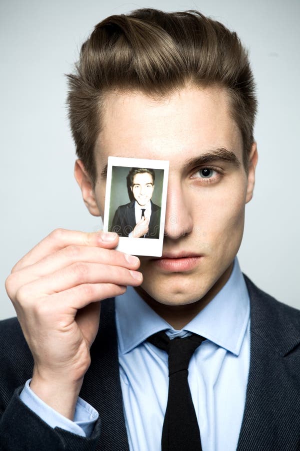 Man with instant photo stock photo. Image of handsome - 23762922