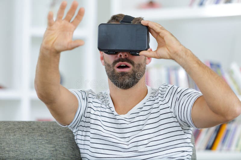 Man Interacting with Virtual Reality Stock Photo - Image of simulation ...