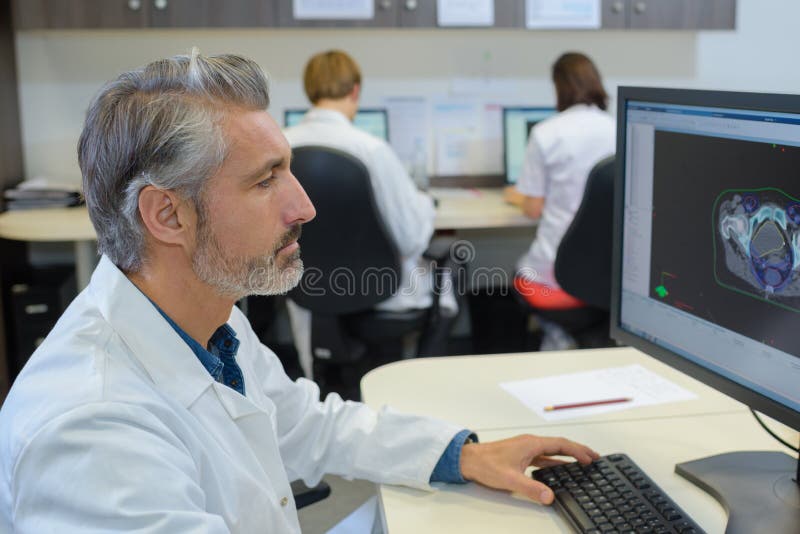 Man interpreting data stock photo. Image of critical - 259682538