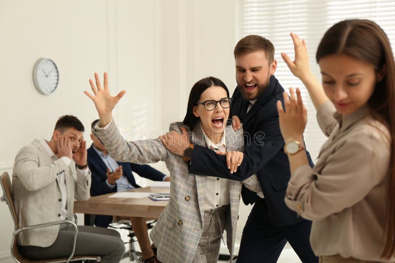 Man Interrupting Colleagues Fight at Work Stock Image - Image of ...