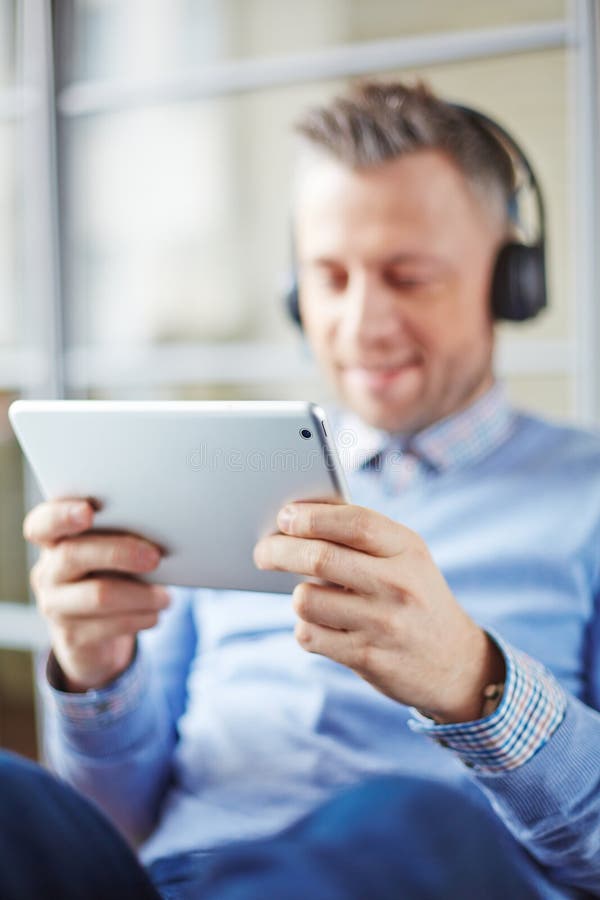 Businessman Holding IPad with News App on the Screen Editorial Stock ...