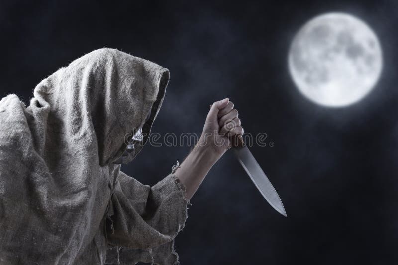 Man in Iron Mask with a Big Knife . Stock Photo - Image of hood, mask ...