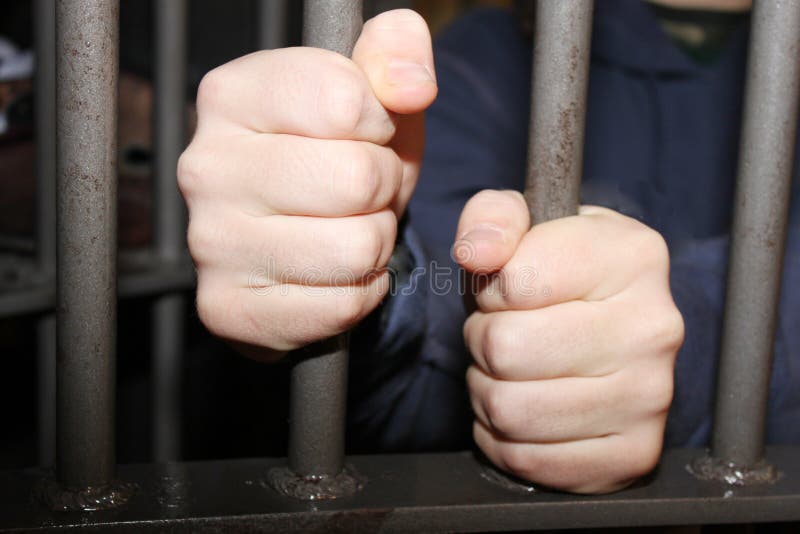 Man in Jail Trying To Reach Out Stock Image - Image of confined ...