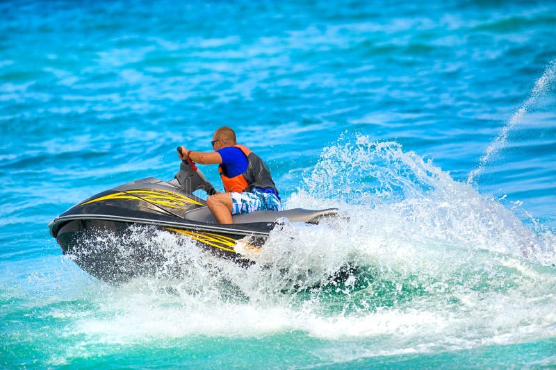 Man on jet ski stock photo. Image of activity, person - 19465088