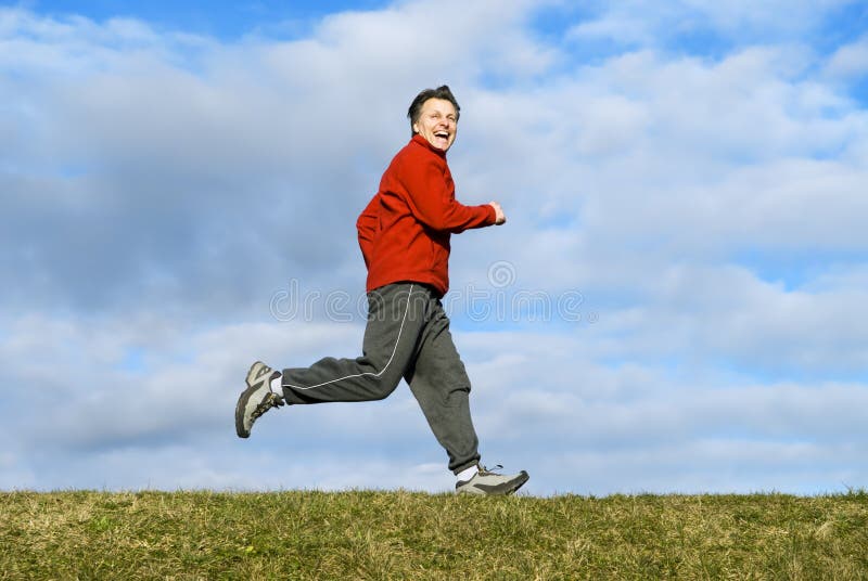 Man jogging in blue shirt stock image. Image of healthy - 25040259