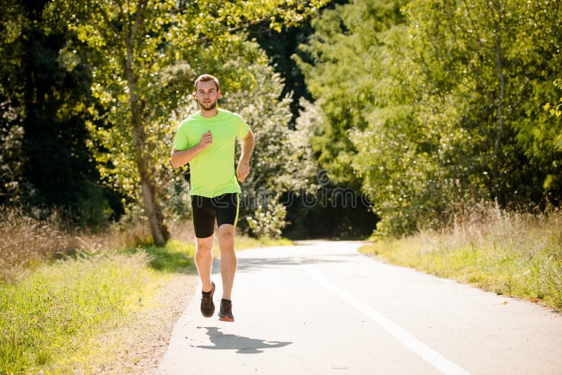 Man jogging in park stock photo. Image of athlete, authentic - 66570726
